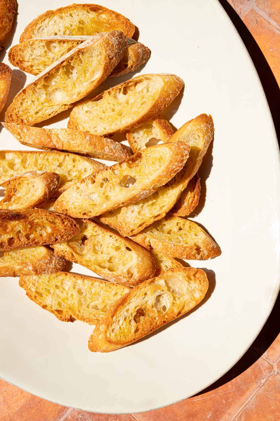 Easy Garlic Crostini Recipe (Perfect for Bruschetta) - Seasoned and Salted