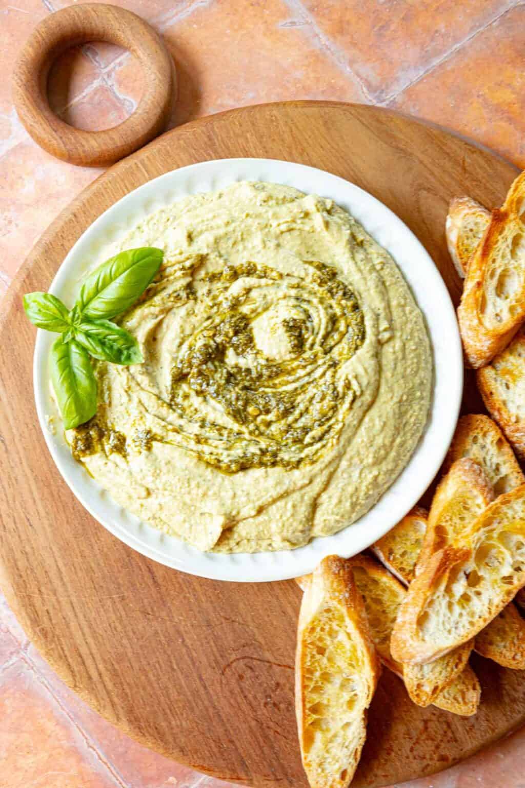Easy Basil Pesto Hummus Recipe (Homemade Creamy Dip) - Seasoned and Salted