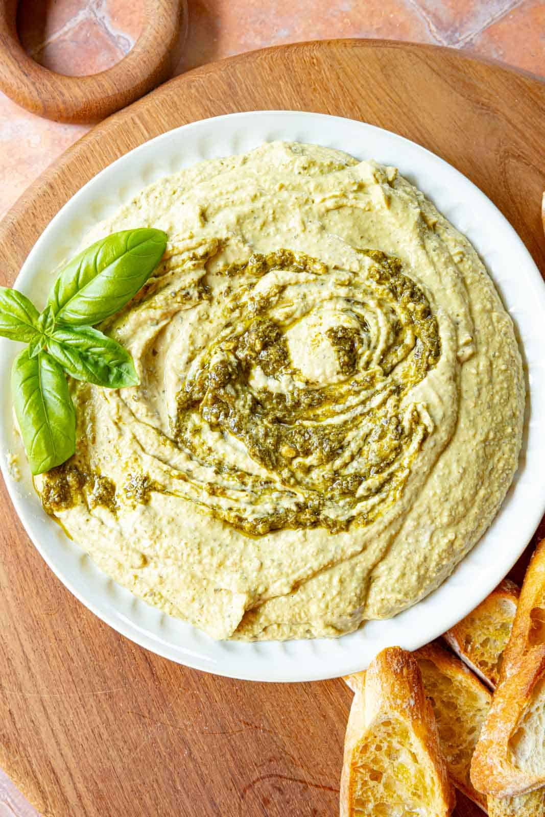 Easy Basil Pesto Hummus Recipe (Homemade Creamy Dip) - Seasoned and Salted