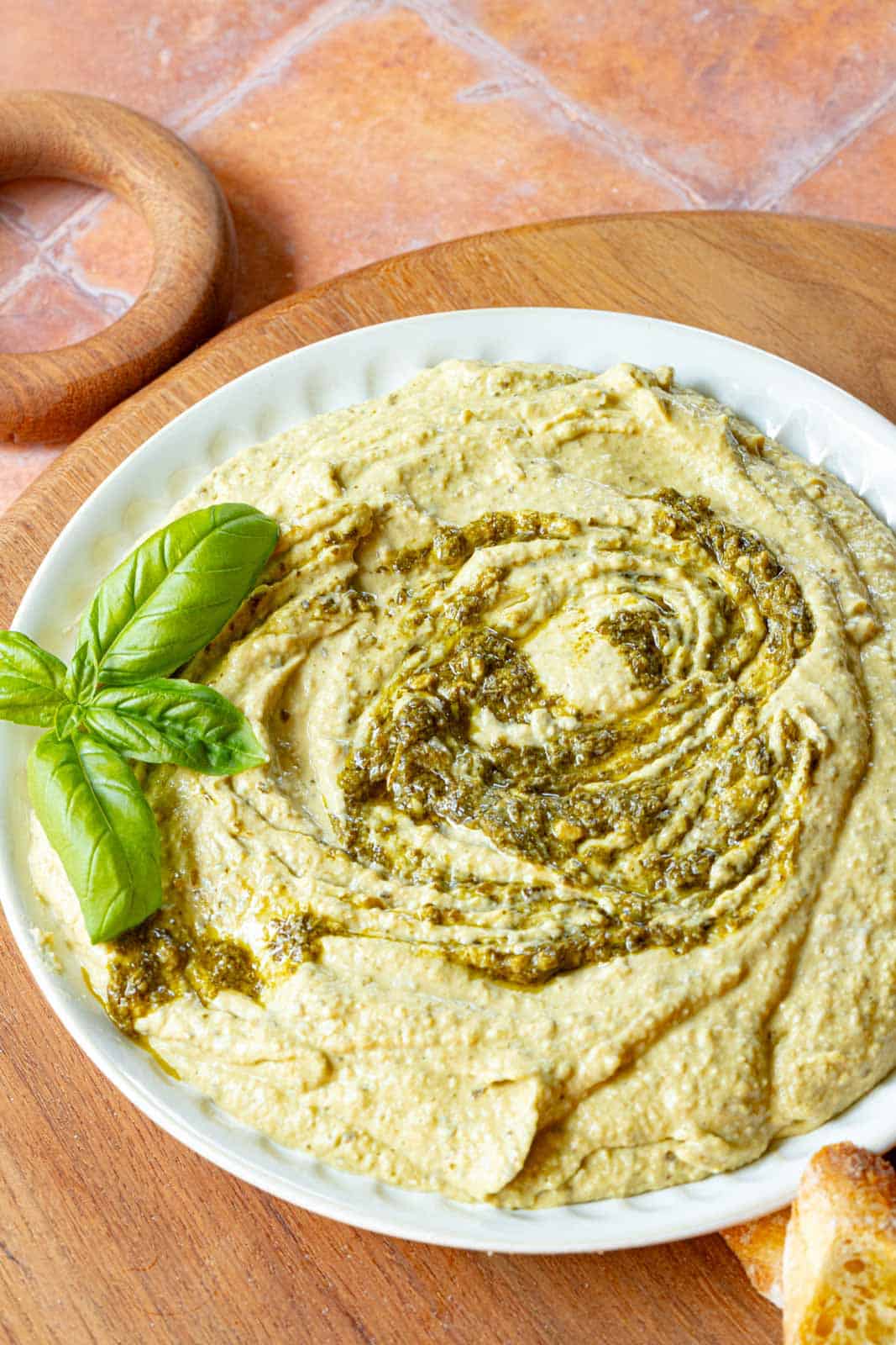 Easy Basil Pesto Hummus Recipe (Homemade Creamy Dip) - Seasoned and Salted