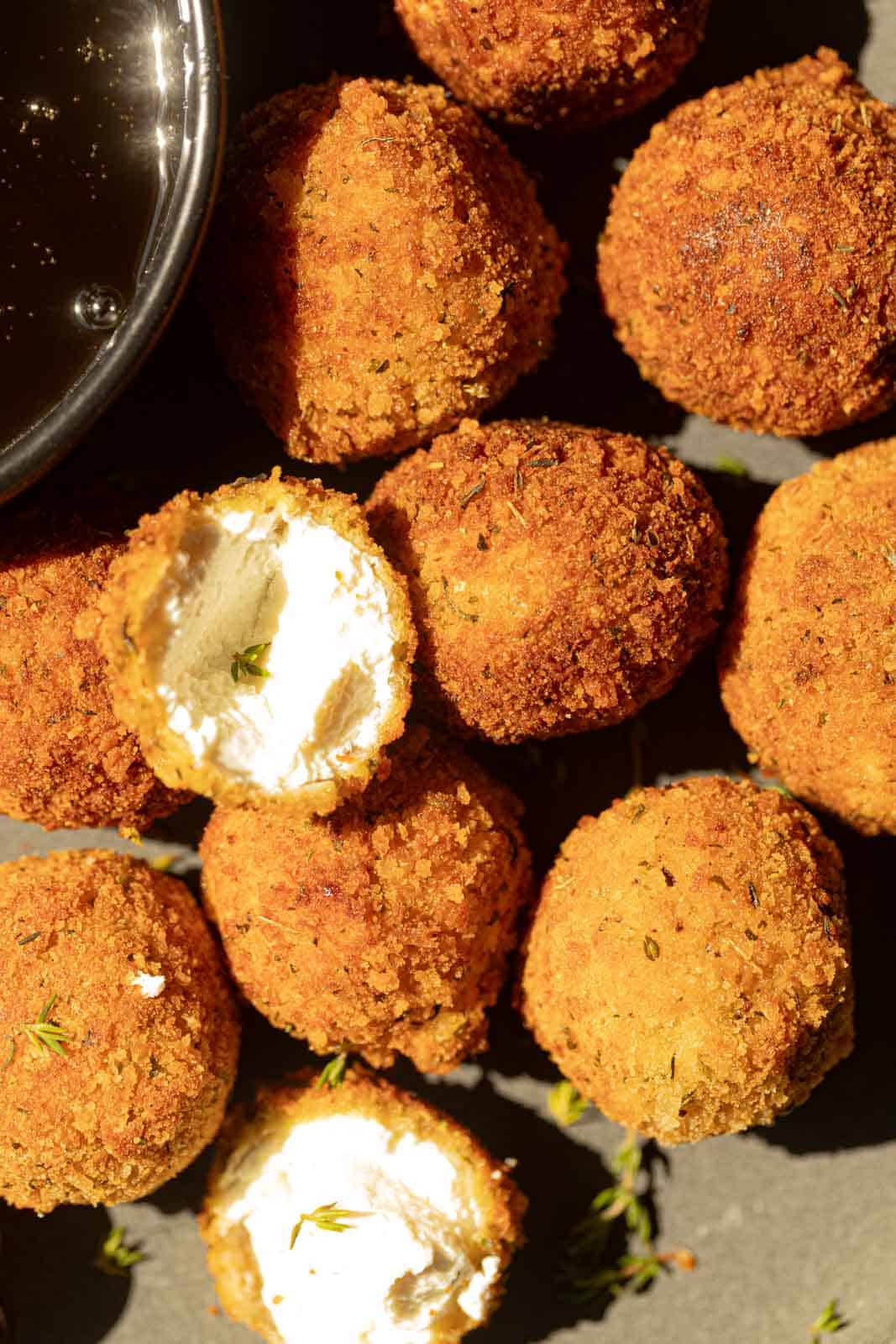 Crispy Fried Goat Cheese Balls with Honey Drizzle - Seasoned and Salted