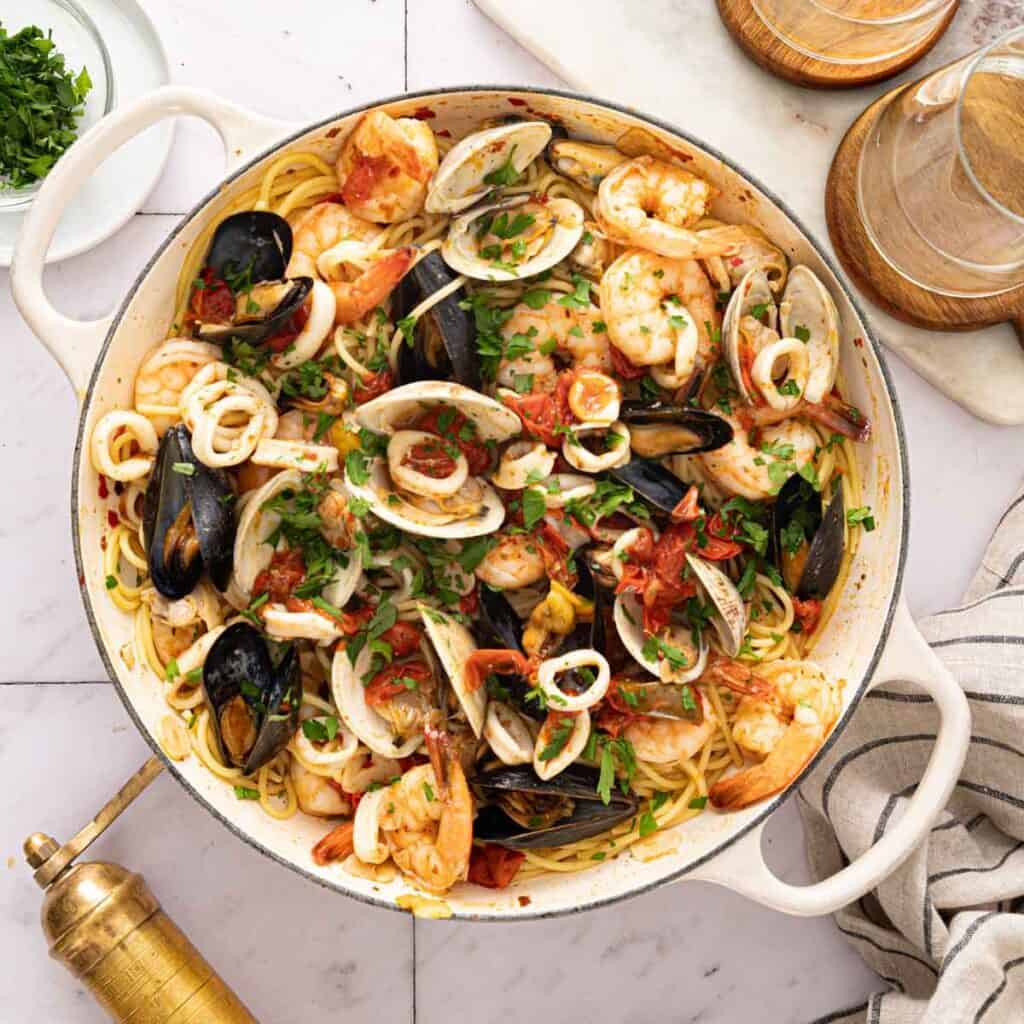 Spaghetti allo Scoglio (Italian Seafood Pasta Recipe) - Seasoned and Salted