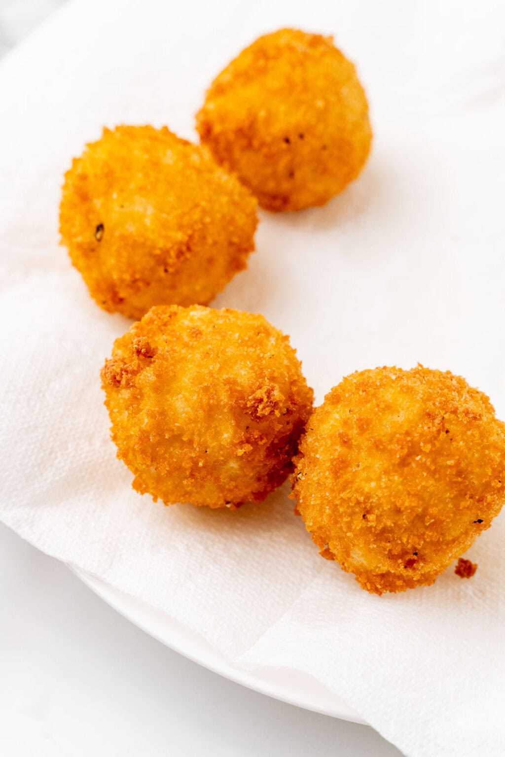 Cheesy Truffle Arancini Recipe (Italian Rice Balls) - Seasoned and Salted