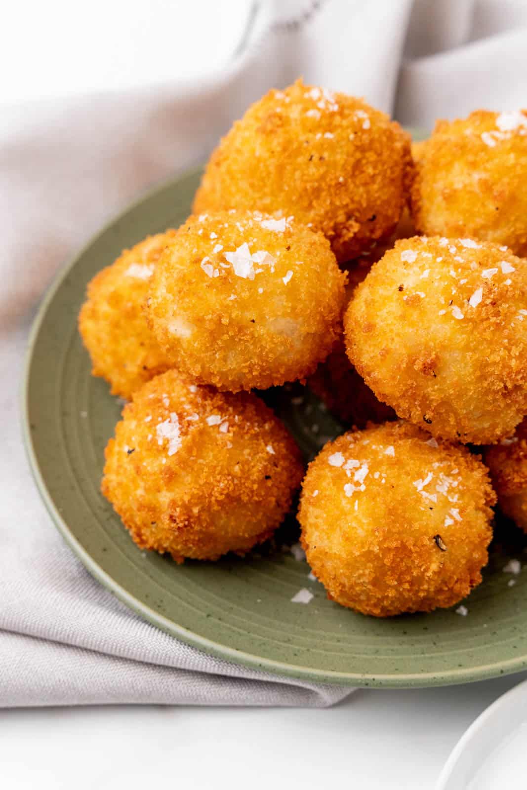 Cheesy Truffle Arancini Recipe (Italian Rice Balls) - Seasoned and Salted