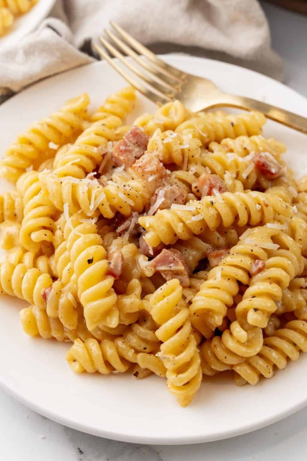 Fusilli Carbonara with Guanciale (No Cream) - Seasoned and Salted