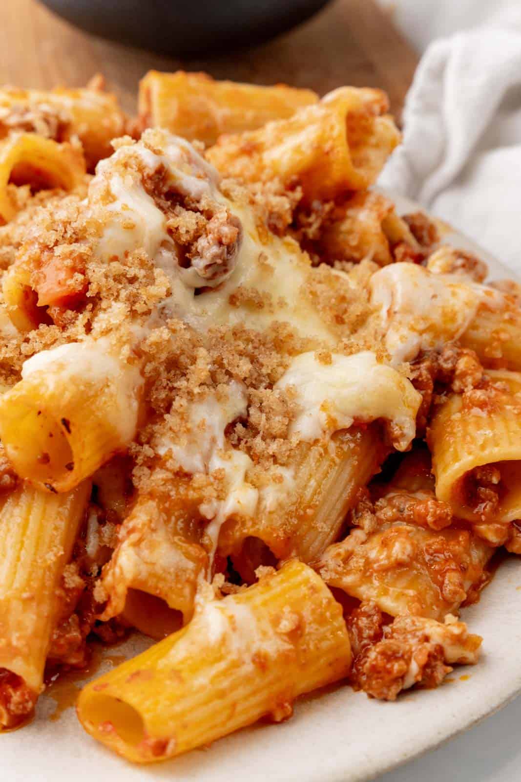 Baked Bolognese Pasta Recipe (Easy Cheesy Pasta Bake) - Seasoned and Salted